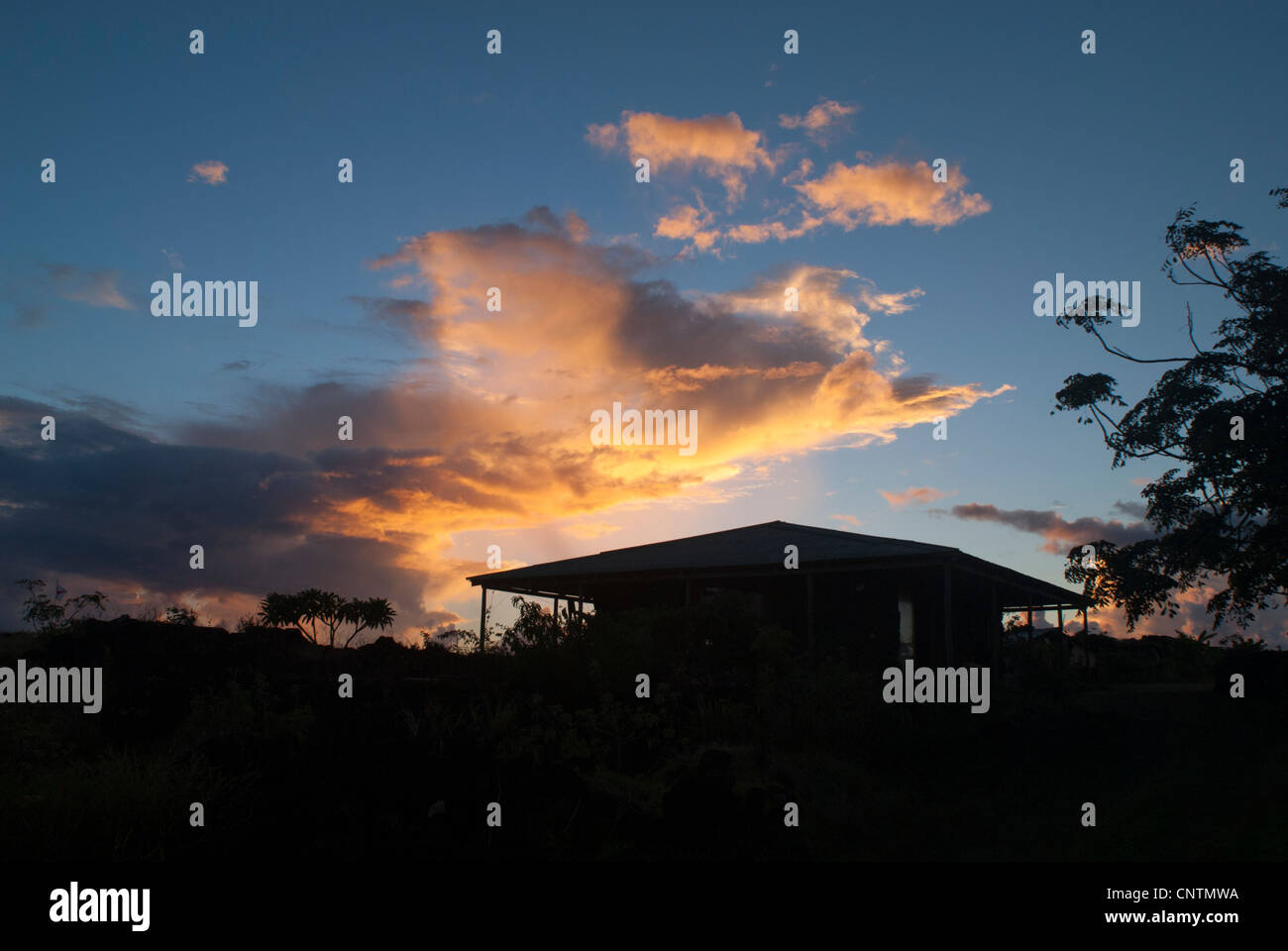 Sunrise over house Easter Island Stock Photo - Alamy