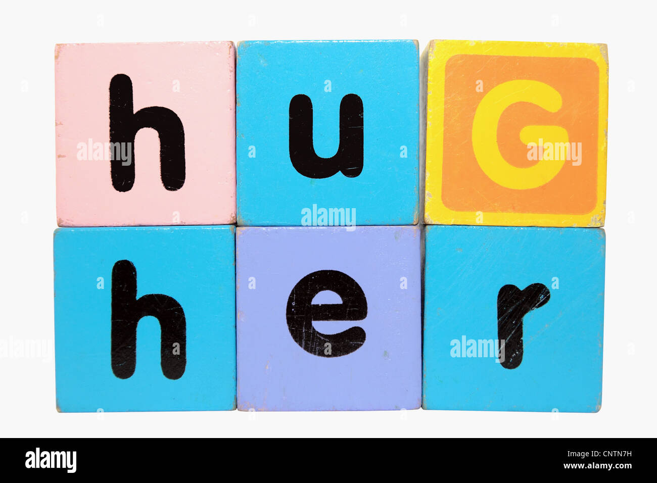 assorted childrens toy letter building blocks against a white ...