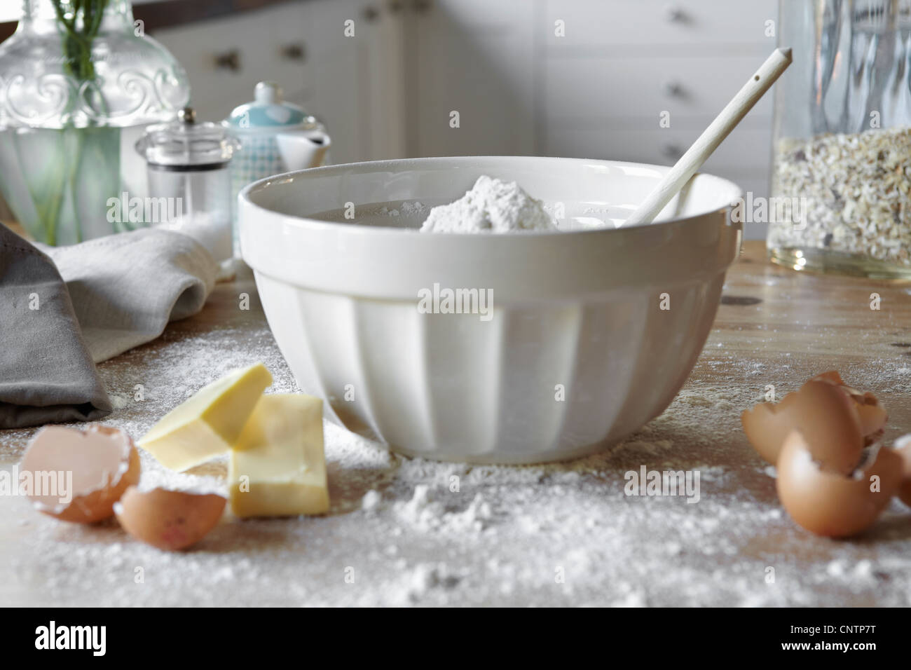 Bowl of mixing dough in messy kitchen Stock Photo - Alamy