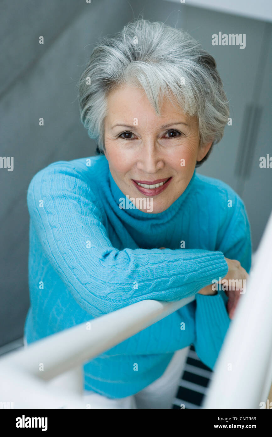 Lady climbing stairs hi-res stock photography and images - Alamy
