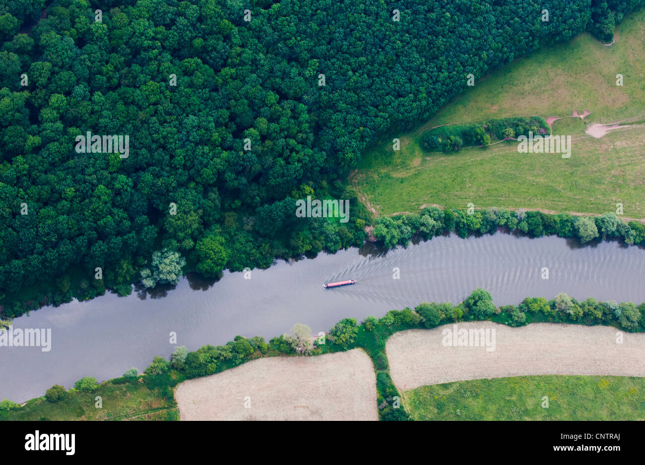 Aerial view of boat in rural river Stock Photo - Alamy