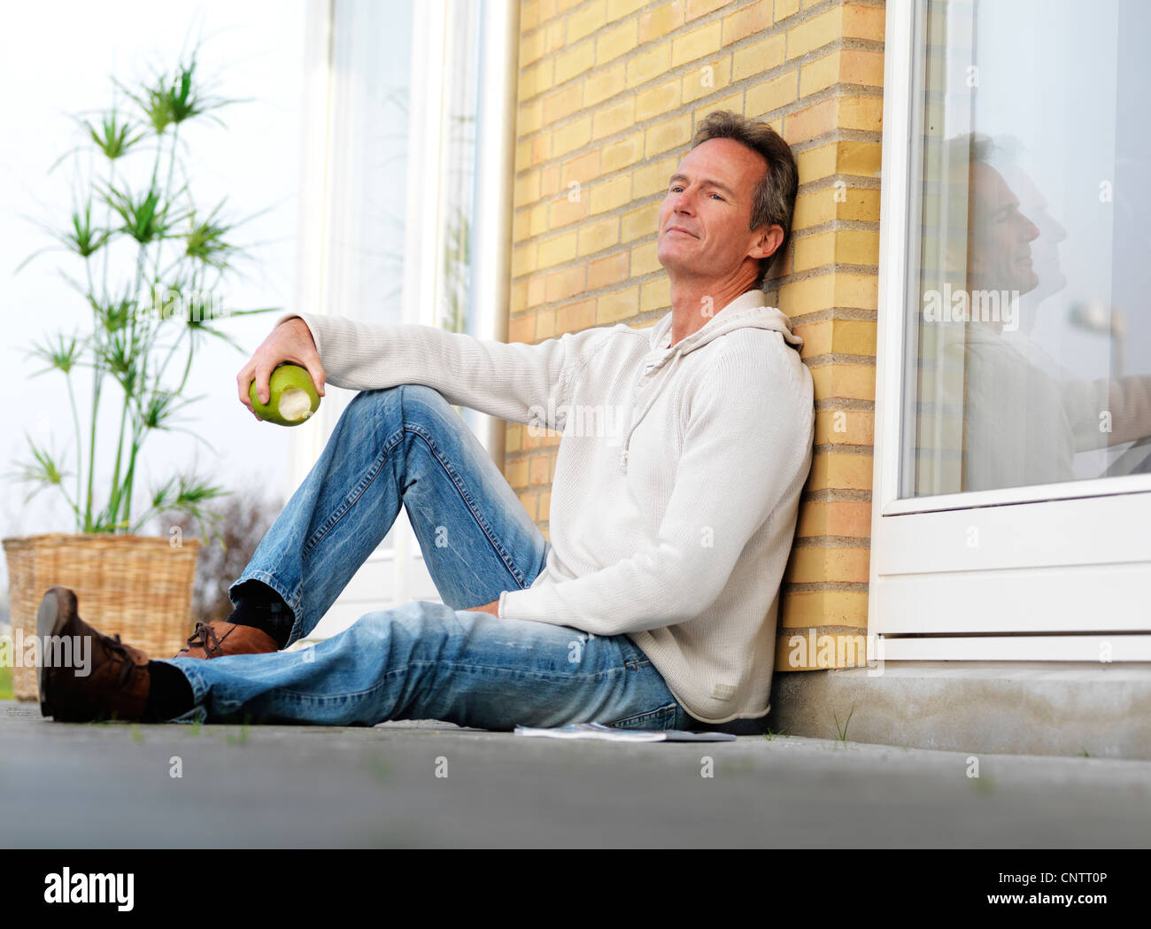 Man leaning on balcony full body hi-res stock photography and images ...