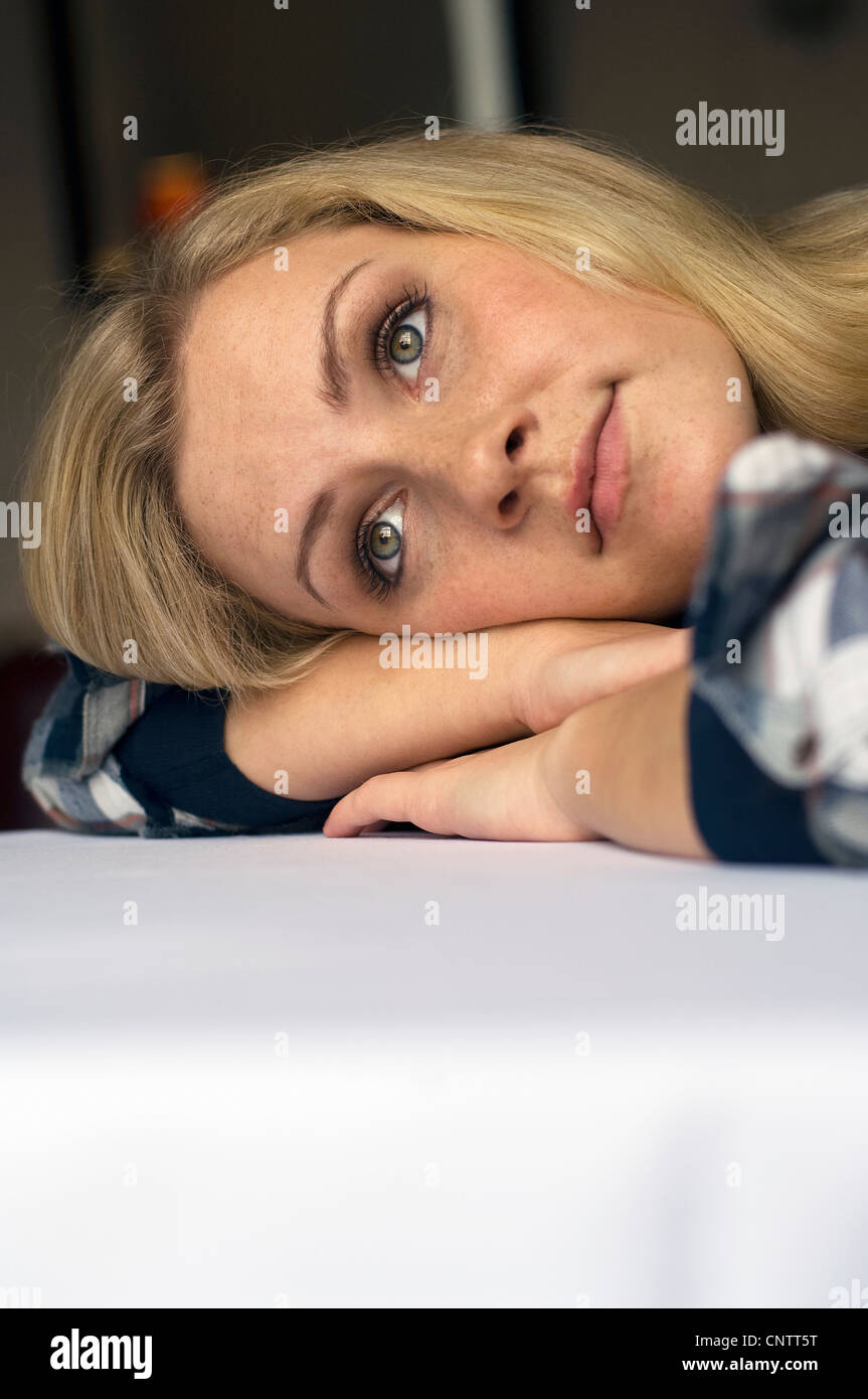 Laying on tabletop hi-res stock photography and images - Alamy