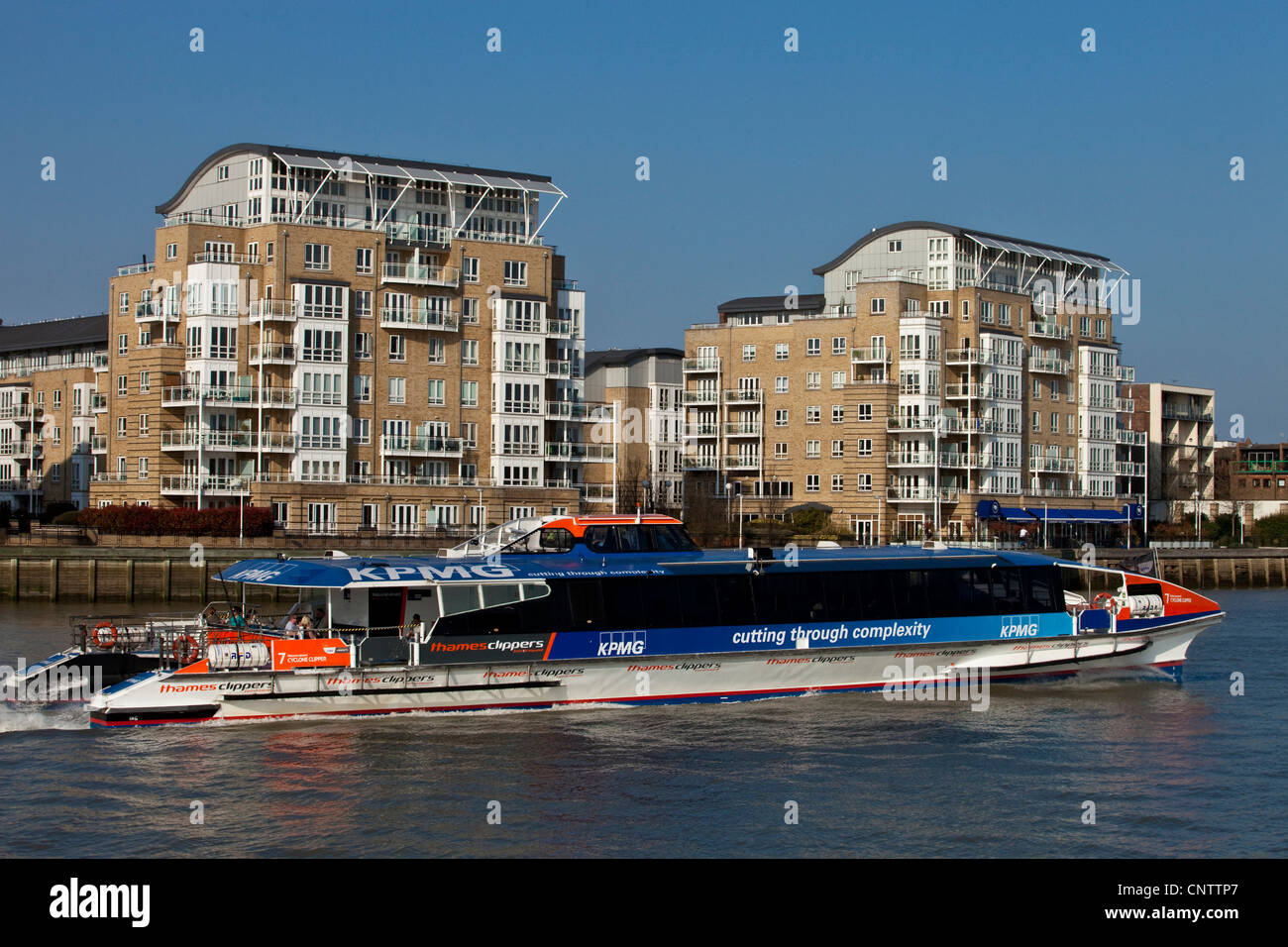 Thames Clipper and Riverside Homes, River Thames, London Stock Photo ...