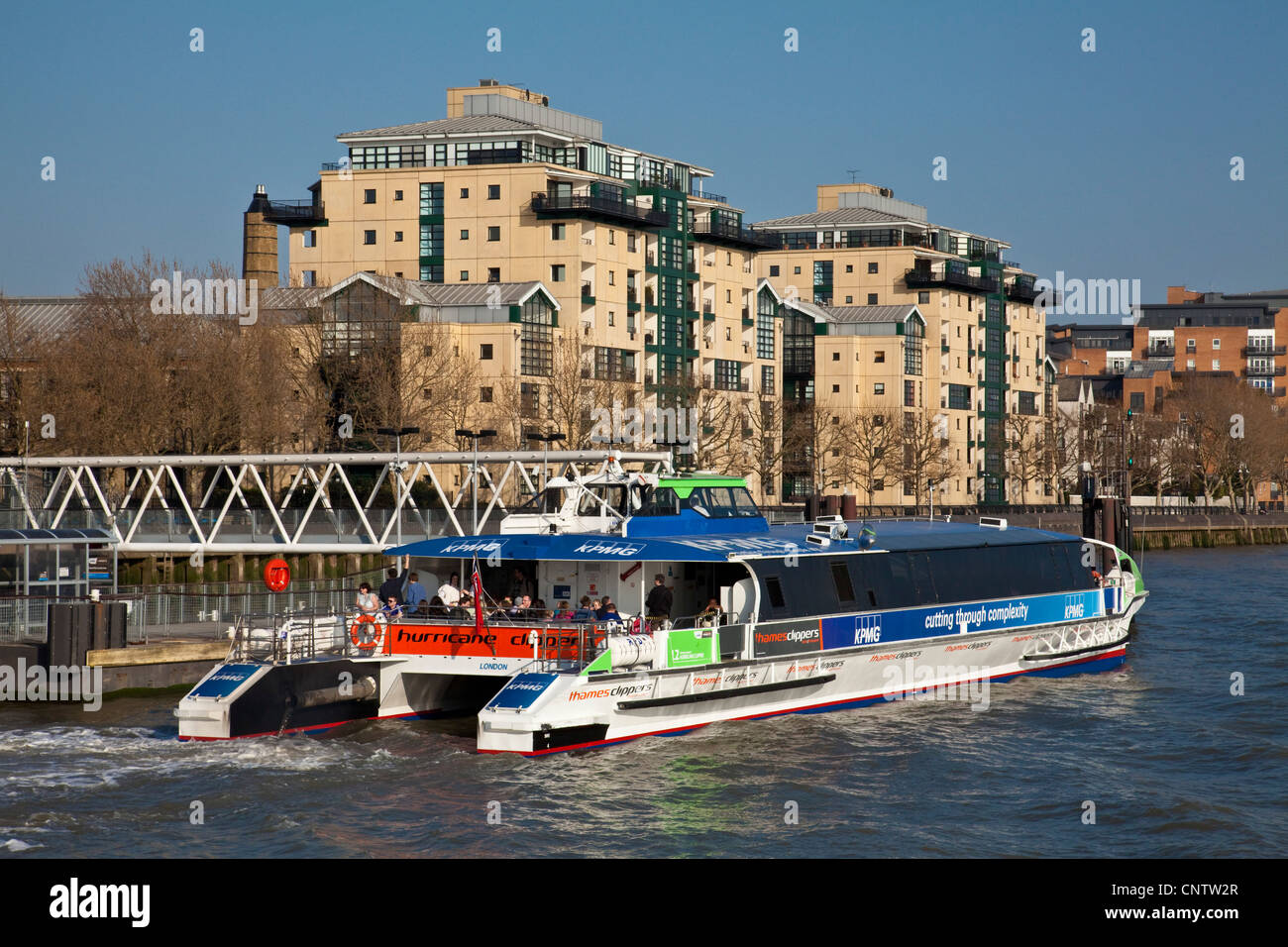 Thames Clipper and Riverside Homes, River Thames, London Stock Photo ...