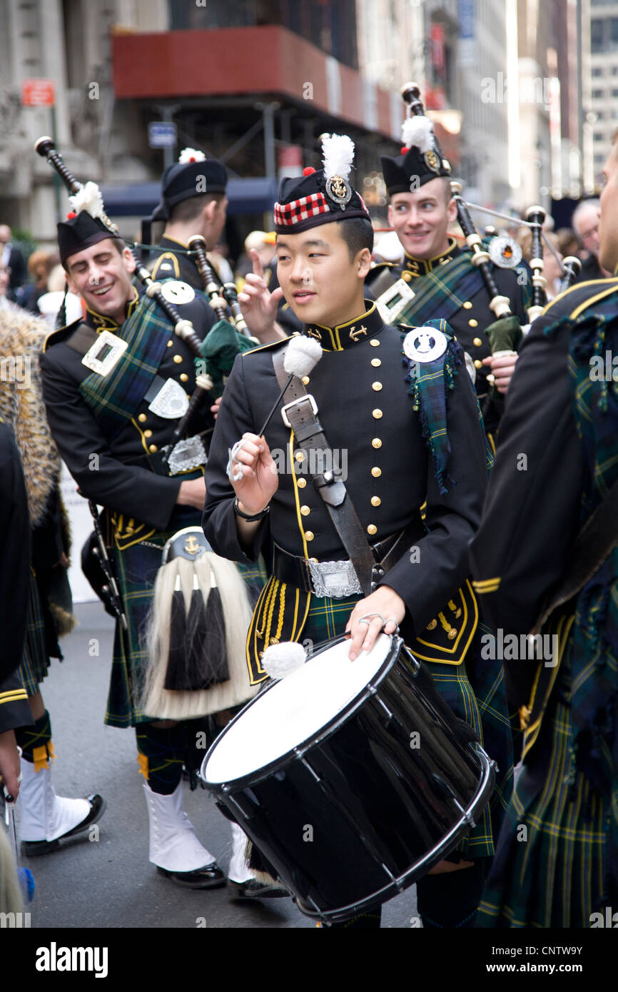 Scottish bagpipers, dancers, and onlookers enjoy the annual Tartan Day ...