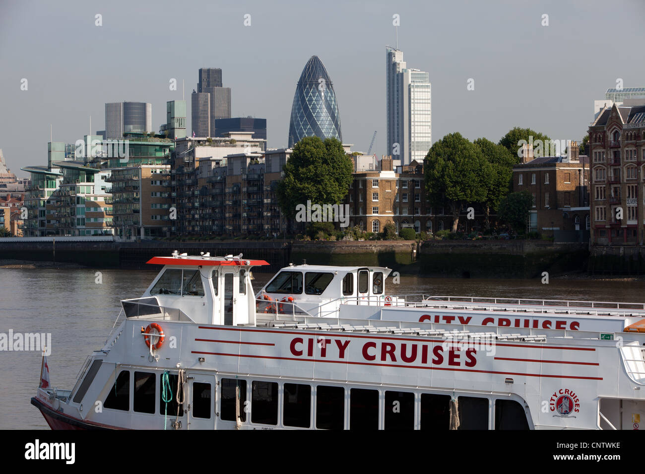 City Cruises sightseeing tourist boat on River Thames looking north ...