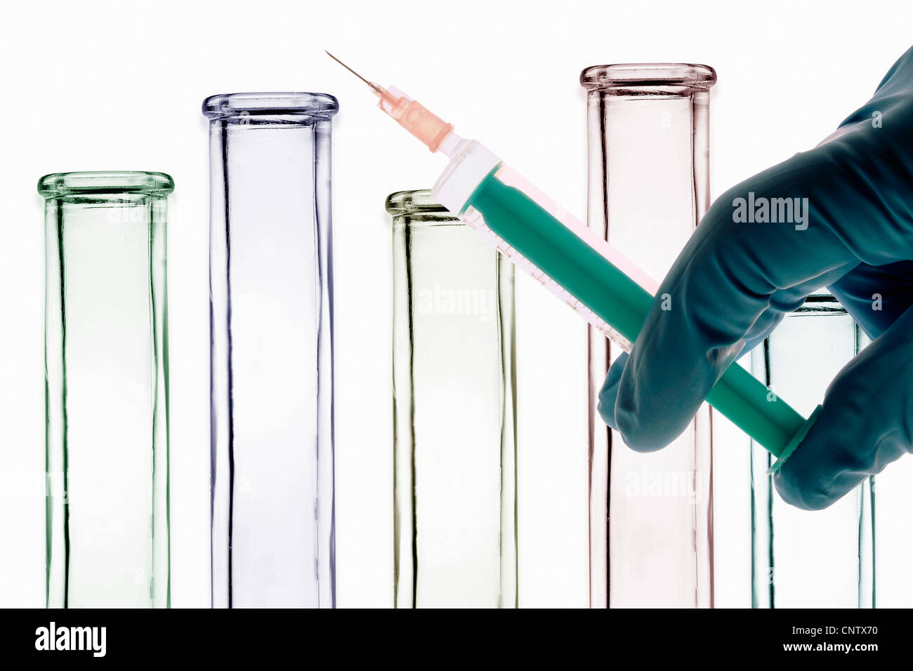 Scientist holding syringe in lab Stock Photo - Alamy