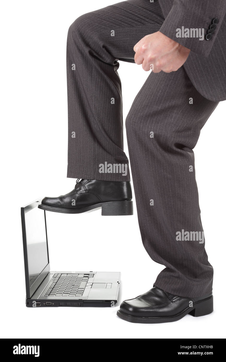 Businessman smashing computer hi-res stock photography and images - Alamy