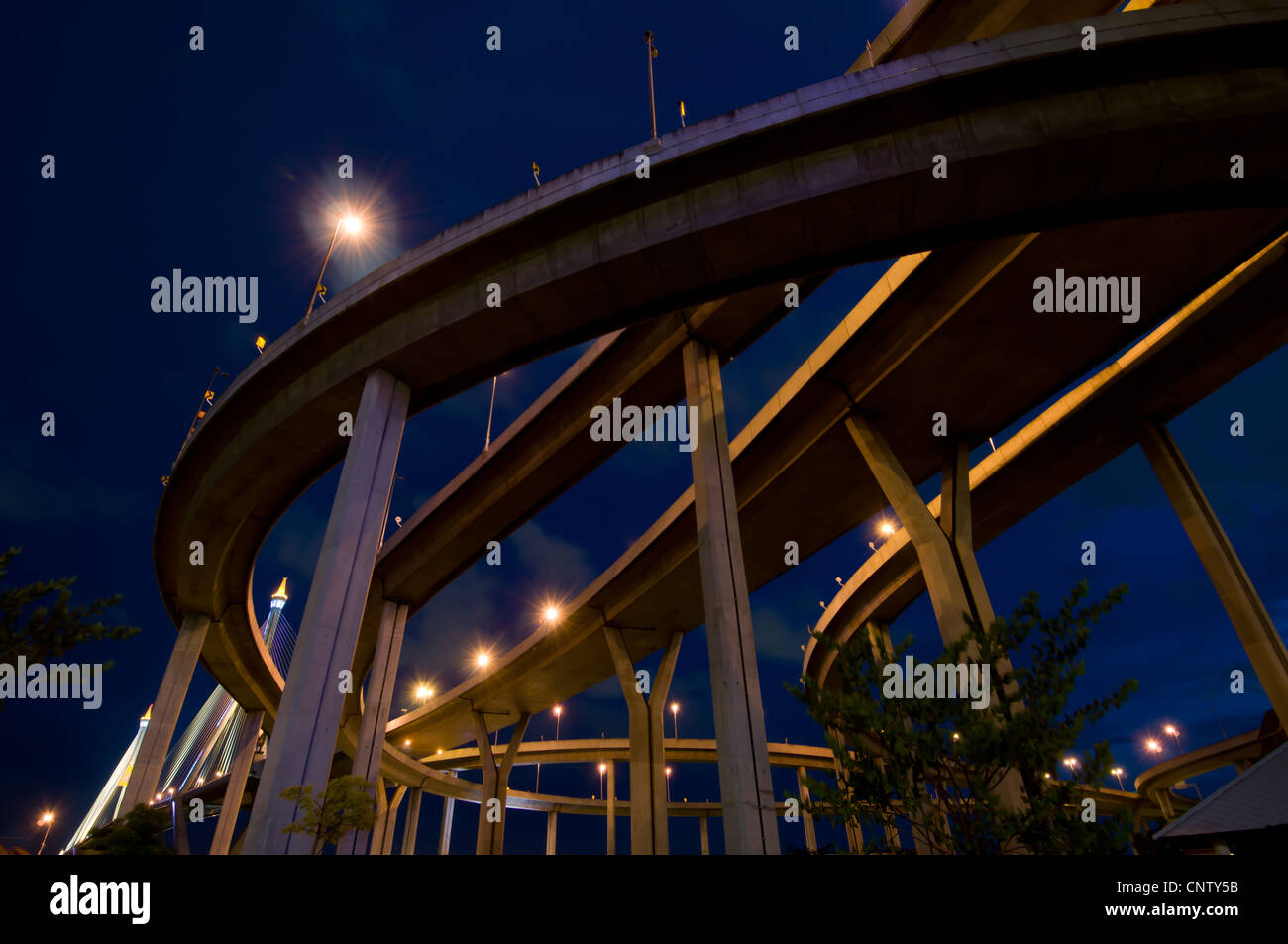 Crossing highway bridge in twilight Stock Photo - Alamy