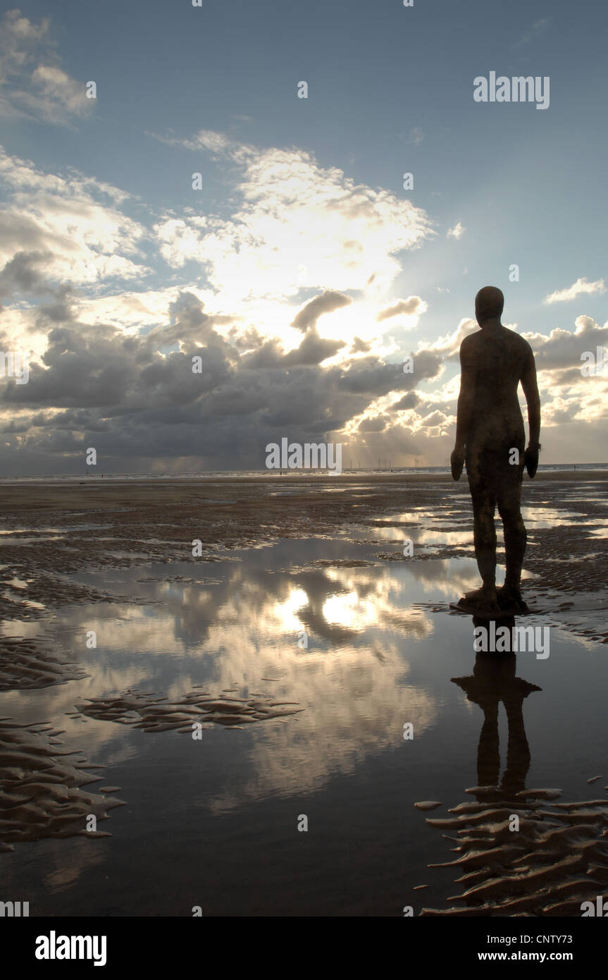 Anthony Gormley's Iron Man on Crosby Beach Merseyside UK Stock Photo ...