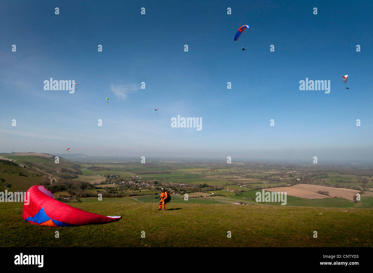 Parascender flying over the South Downs at Devil's Dyke Stock Photo - Alamy