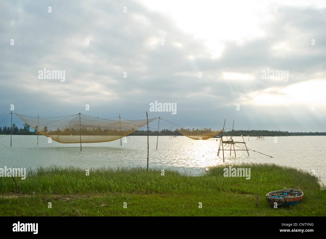 Horizontal view of empty fishing nets, lưới cá, waiting to be lowered ...