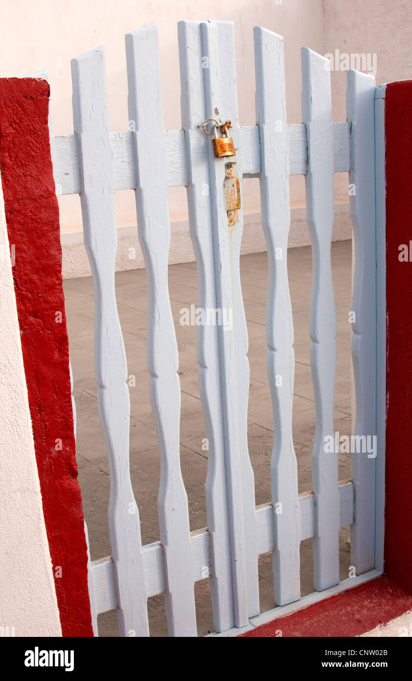 Blue gate with peeling paint hi-res stock photography and images - Alamy