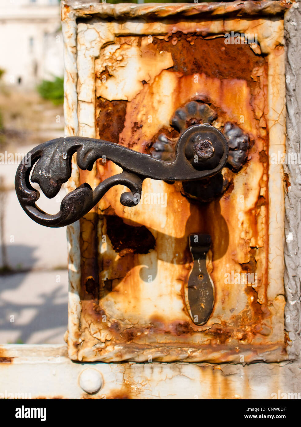 old metal designed rusty door knob Stock Photo - Alamy