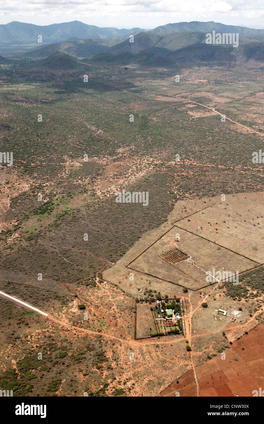 Farm house in savannah bush land, aerial view, Pare Mountains ...