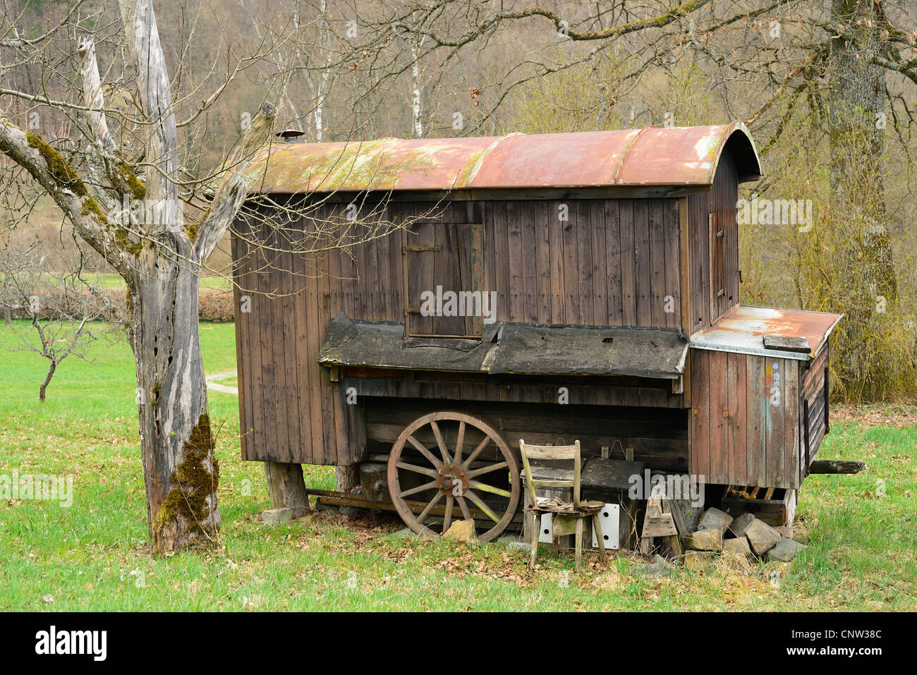 Old wooden construction trailer in a meadow Stock Photo - Alamy