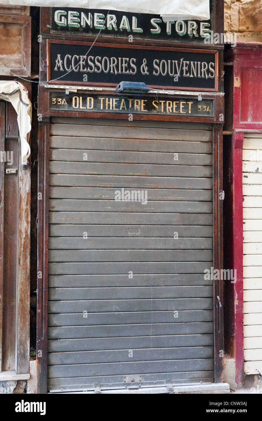 An old shuttered general store at Victoria on the Maltese Island of ...