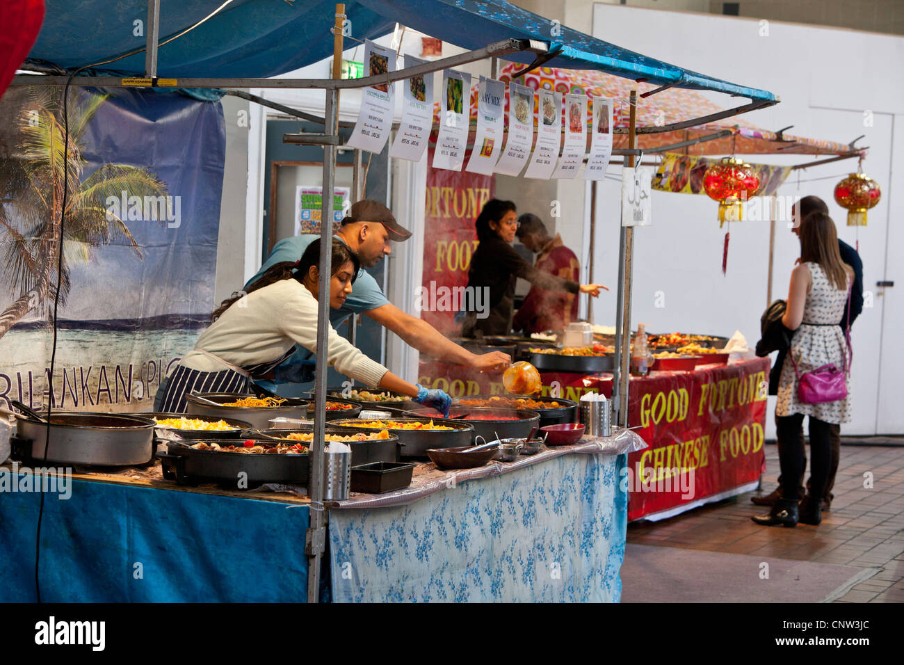 Asian food stalls, Spitalfield London, England, UK Stock Photo - Alamy