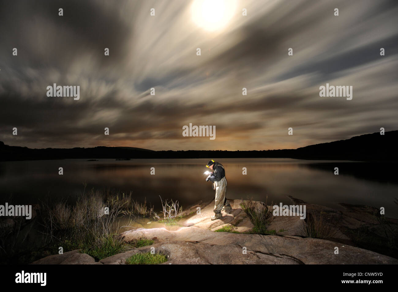 photograher at night at Lago di Baratz, Italy, Sardegna, Lago d`Baratz ...