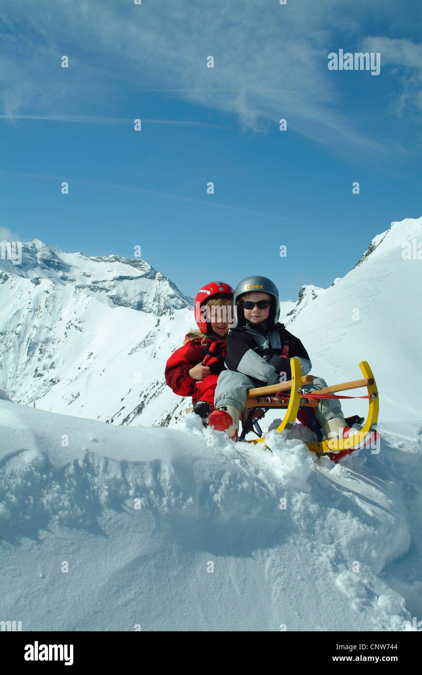 Two boys on toboggans in hi-res stock photography and images - Alamy