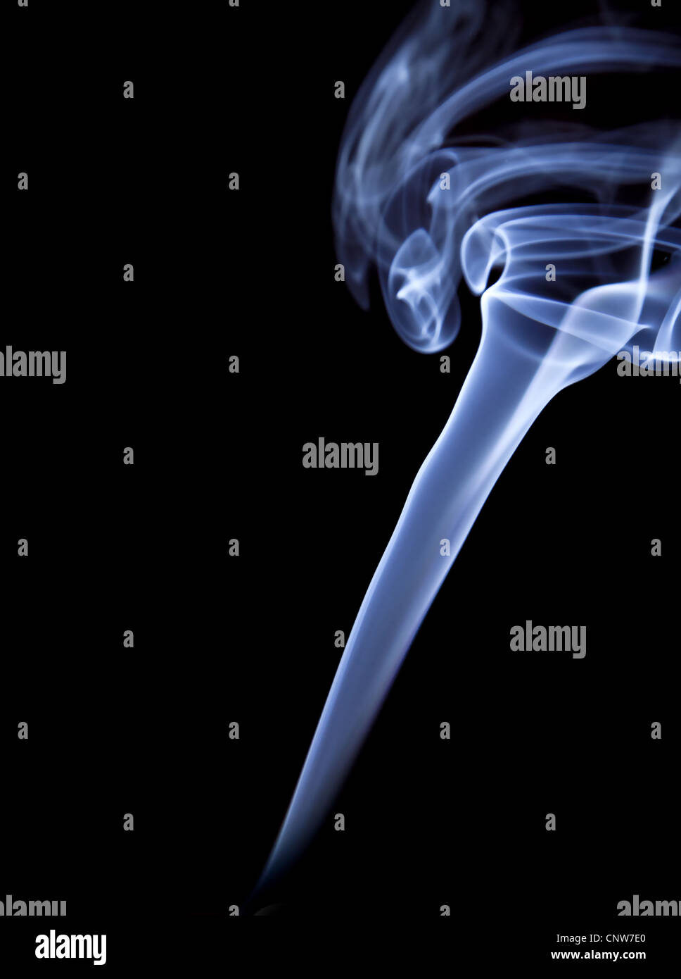 wisp of smoke isolated on black Stock Photo - Alamy
