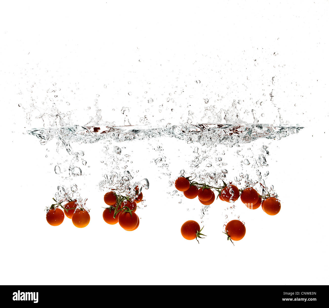 Cherry tomatoes in water motion hi-res stock photography and images - Alamy