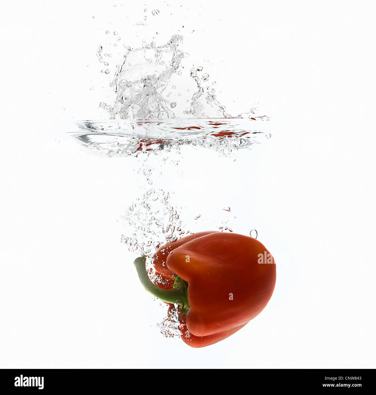 Bell pepper splashing in water Stock Photo - Alamy