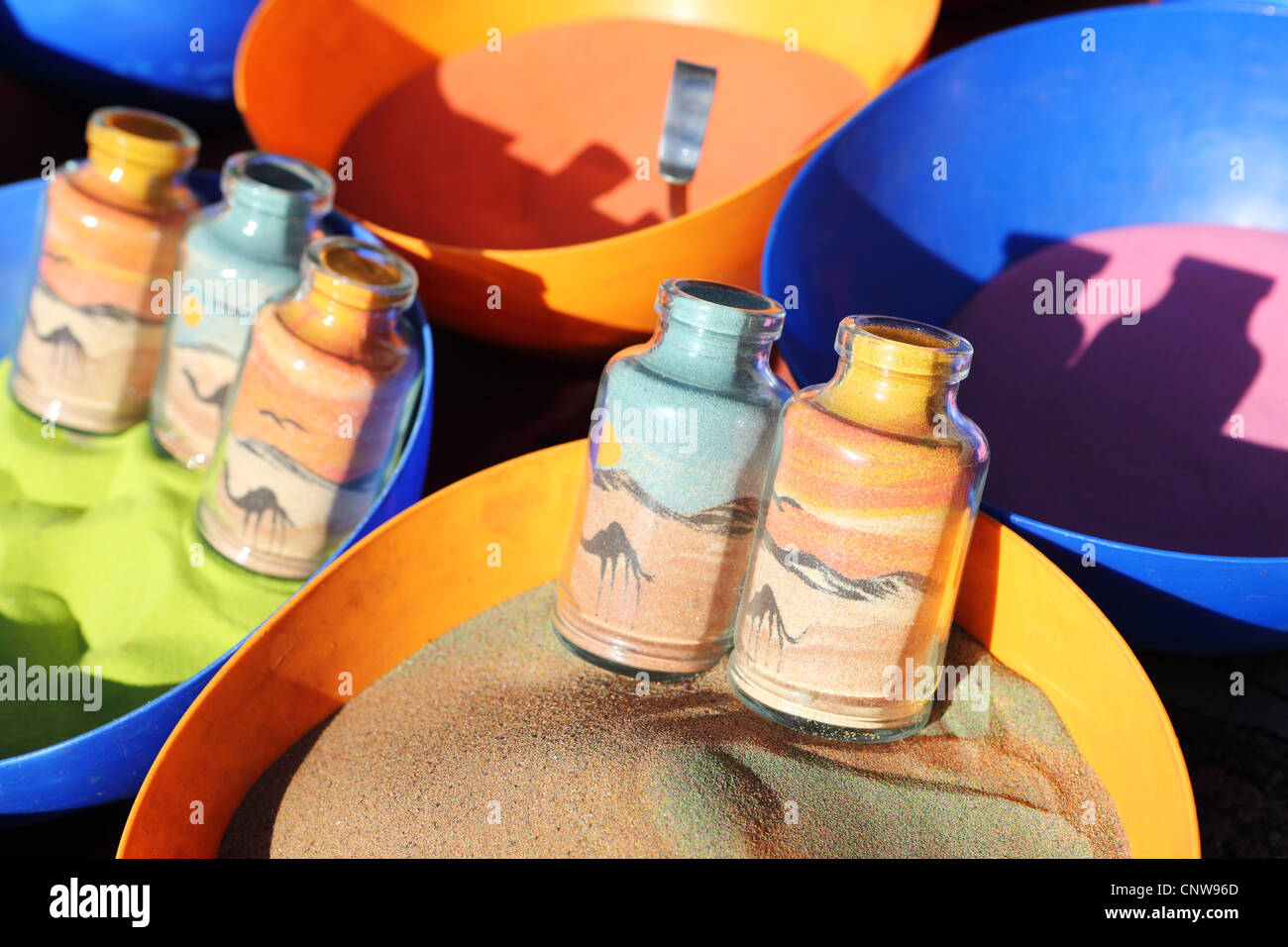 Drawing colored sand Stock Photo - Alamy