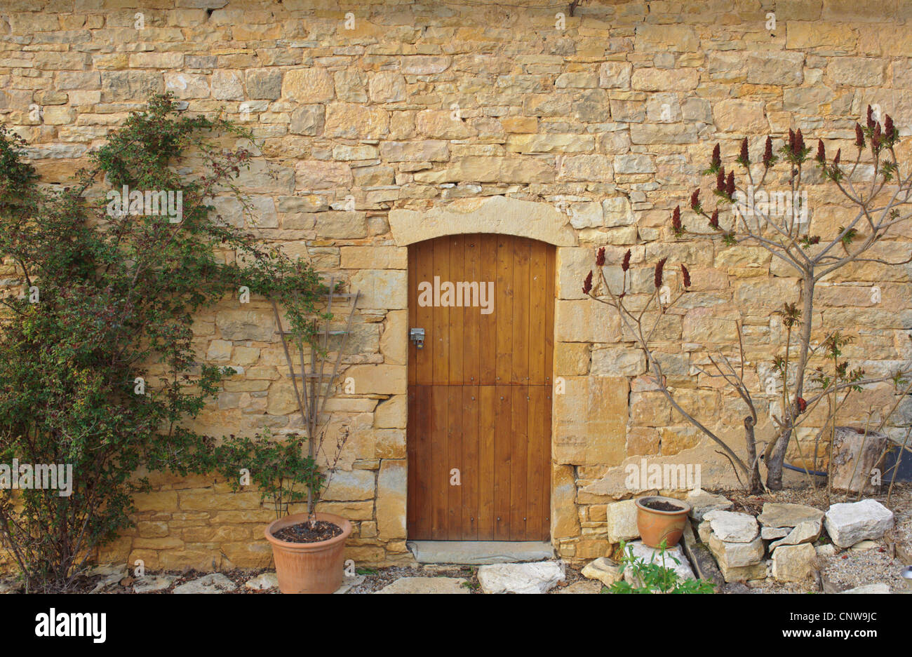 Wooden doors in old French stone barns in southern France Stock Photo ...