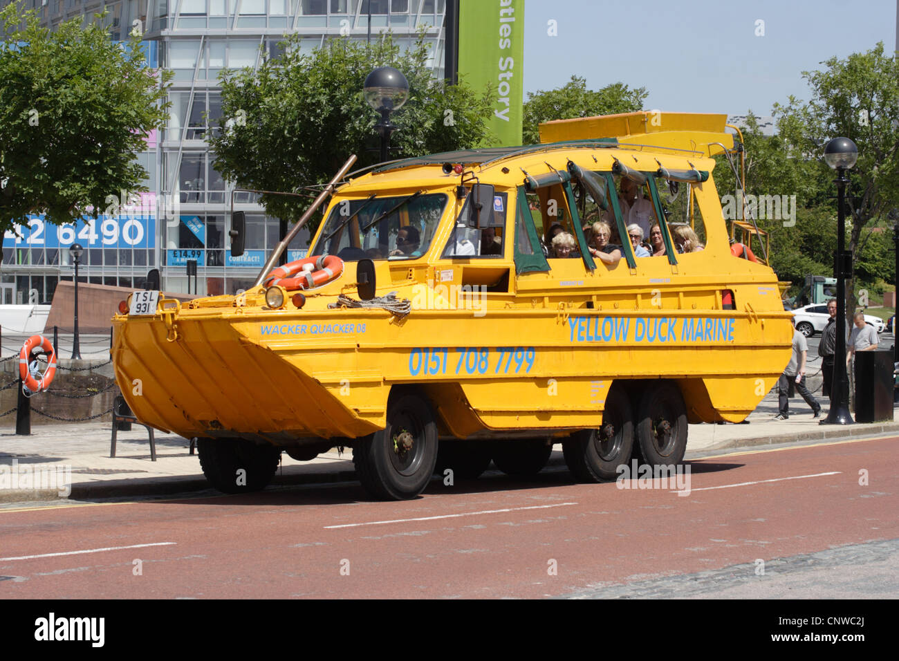 Liverpool Yellow Duck Marine restored army vehicle on road Stock Photo ...
