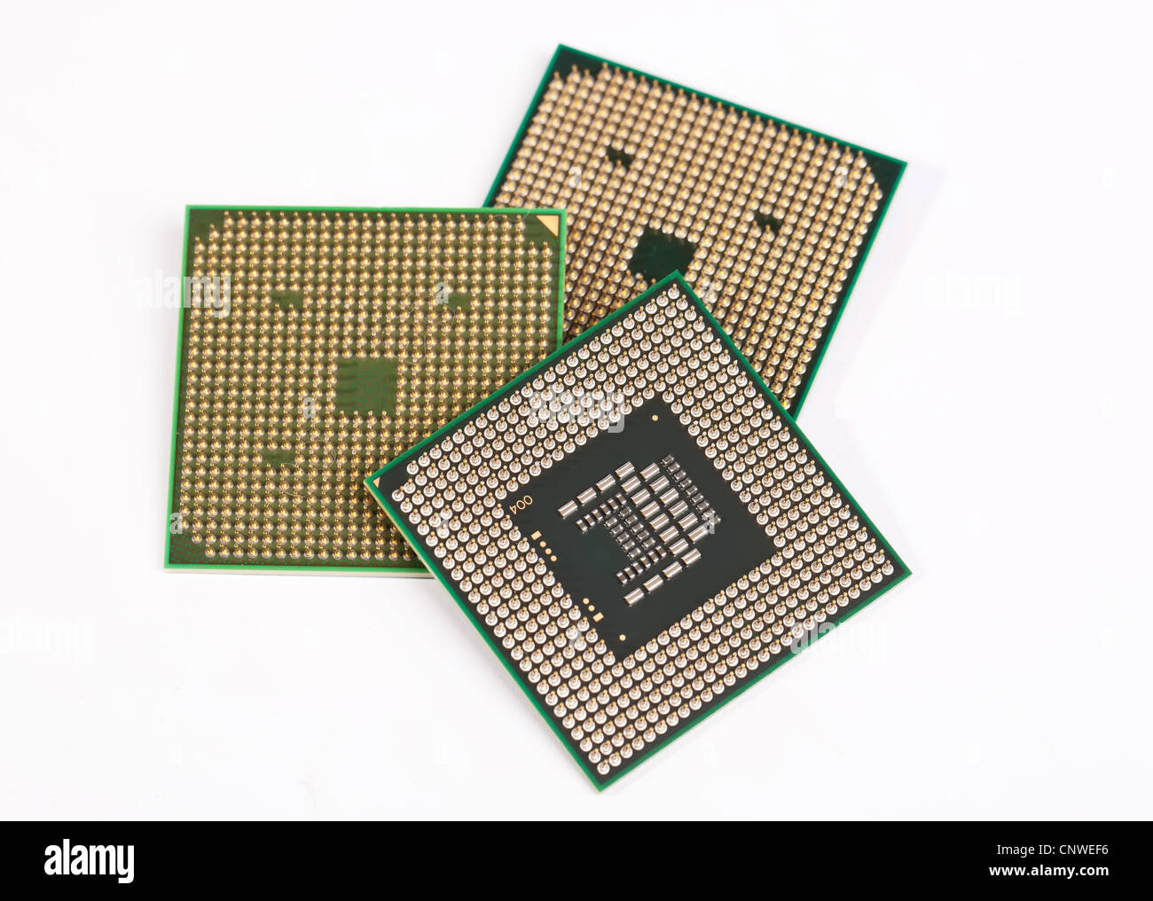 Three laptop processors on the white background Stock Photo - Alamy
