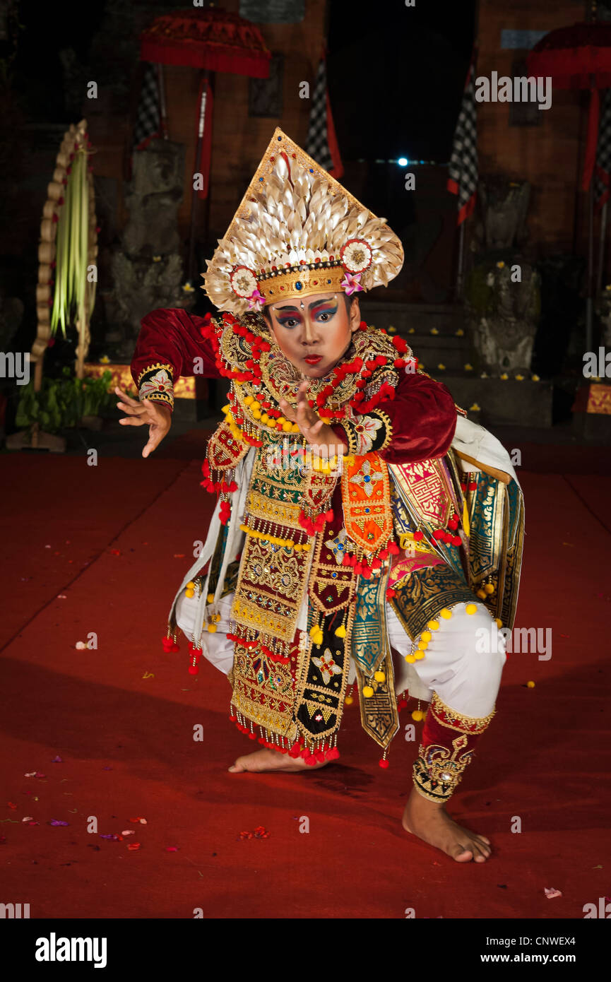 Balinese dancer performing the dance of the warrior in Padangtegal ...