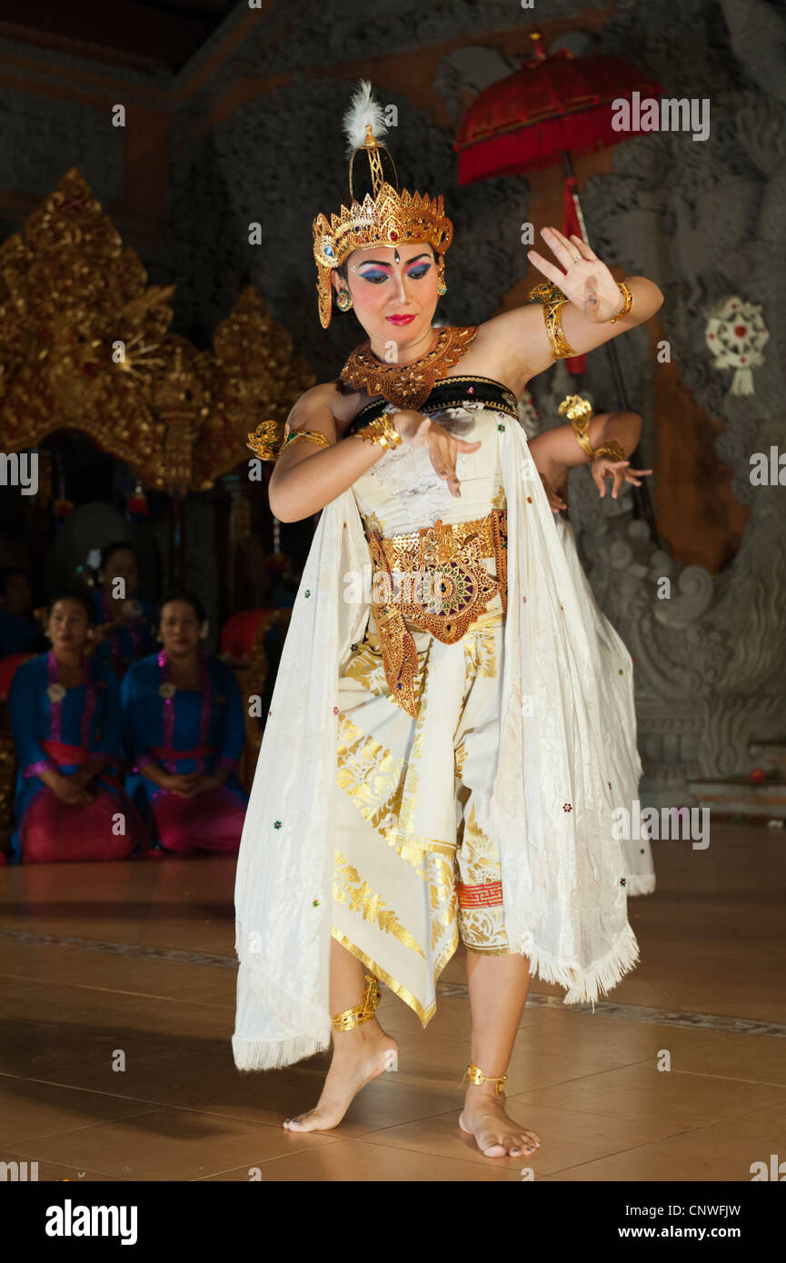 Balinese dancers performing the dance of Bali white starrling birds in ...