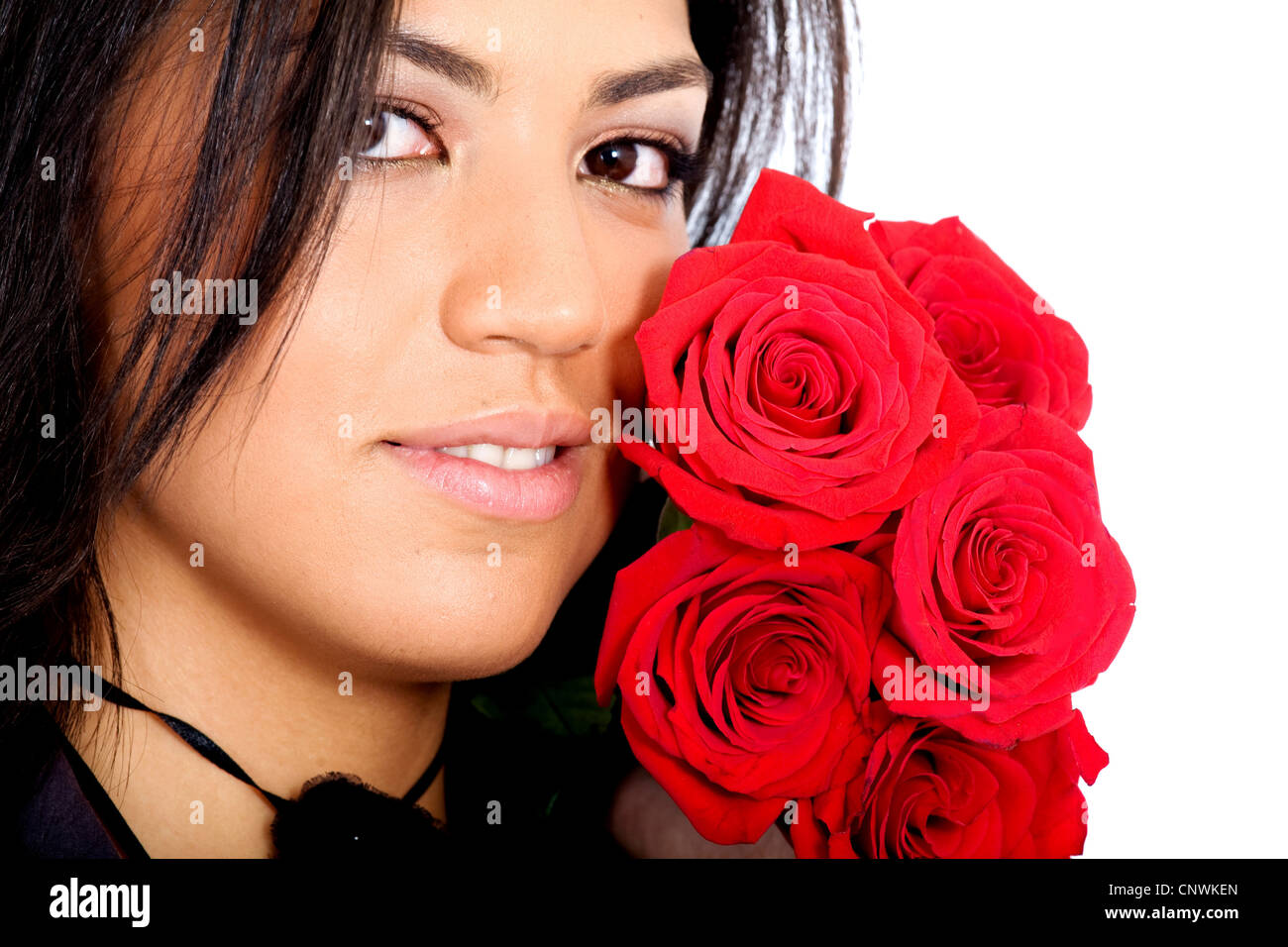 beautiful girl smiling with red roses Stock Photo - Alamy