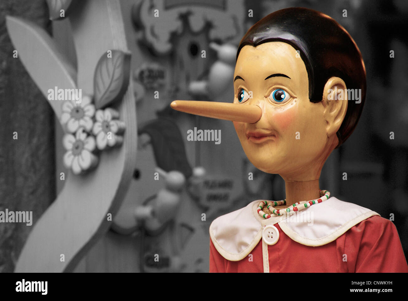 A Pinocchio wooden puppet sold in a carpenter's boutique, in old ...
