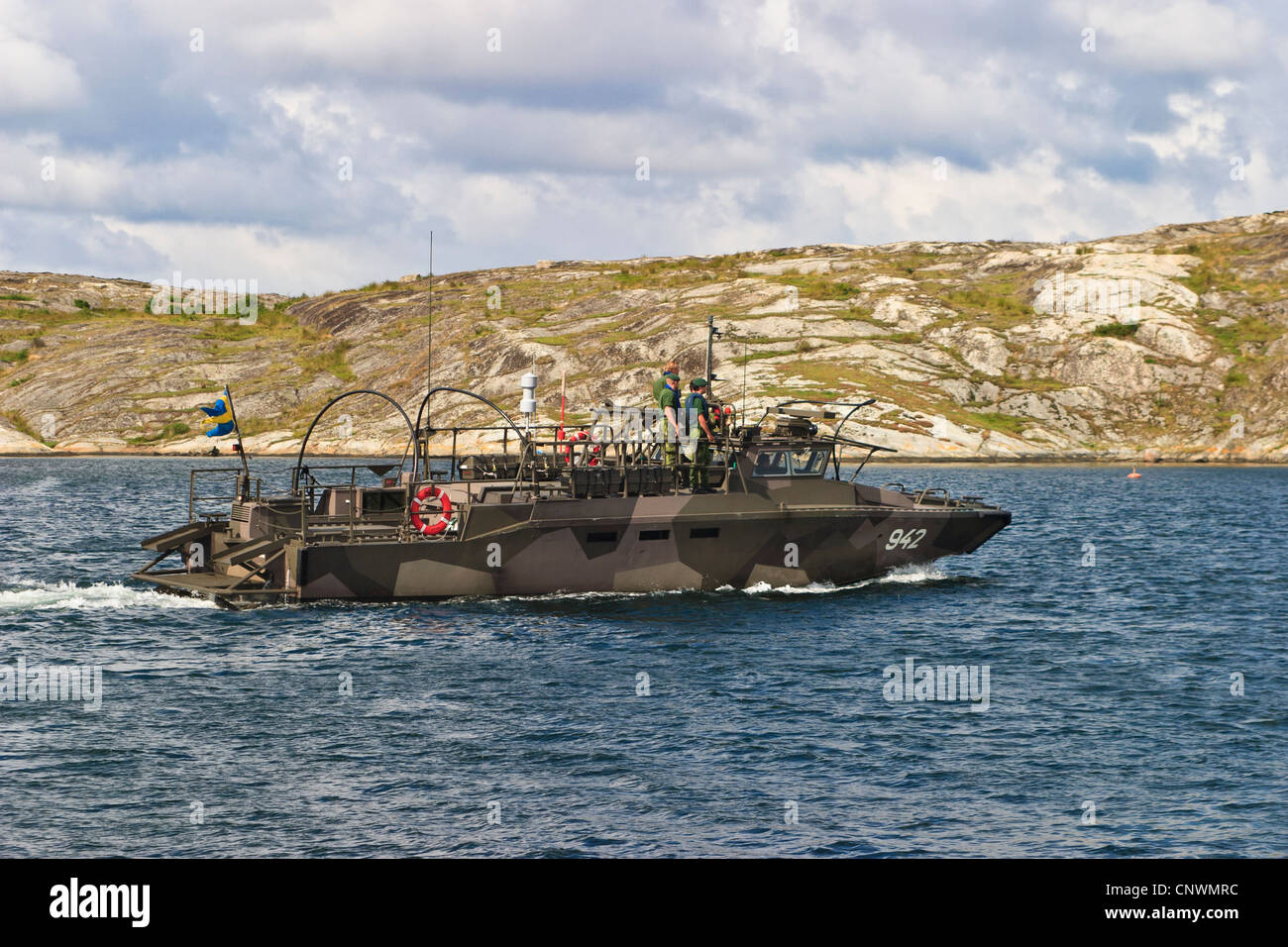 Swedish navy boat in the archipelago with the sailor on deck Stock ...