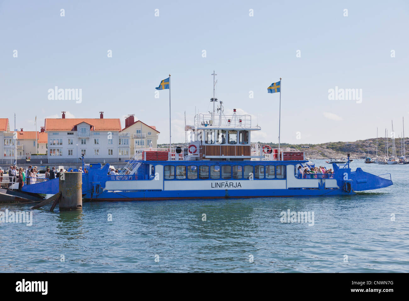 Passengers going on the ferry to Marstrand, Sweden Stock Photo - Alamy