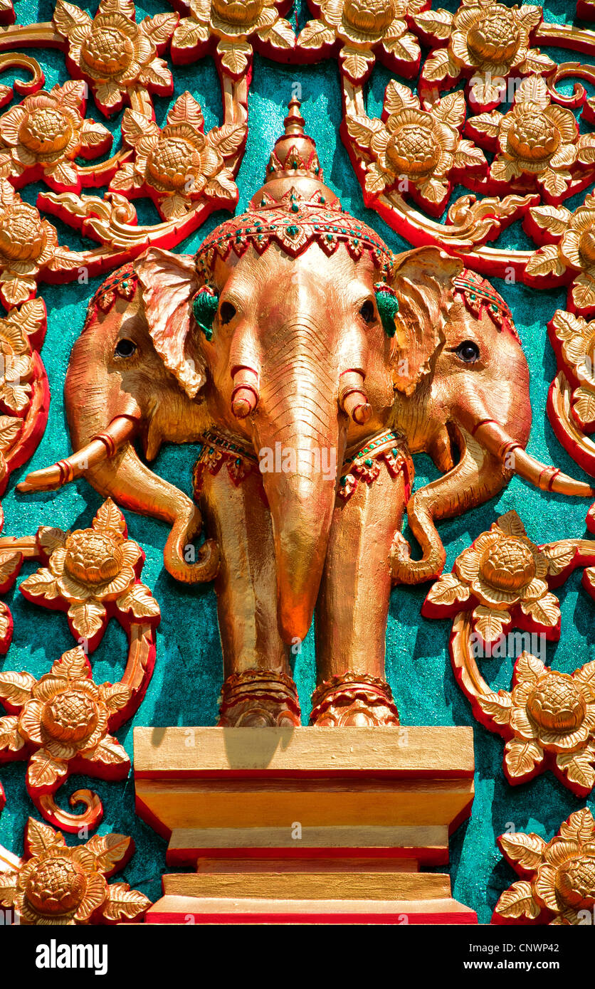 A detailed sculpture of elephants on a Thai buddhist temple in hua hin ...