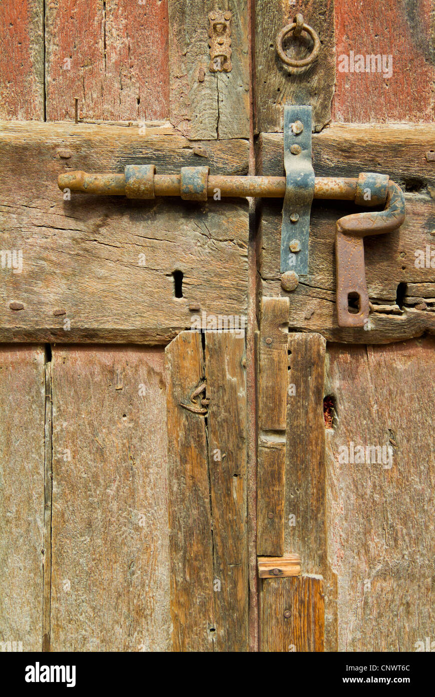 Rusty lock and bolt on a door Stock Photo - Alamy