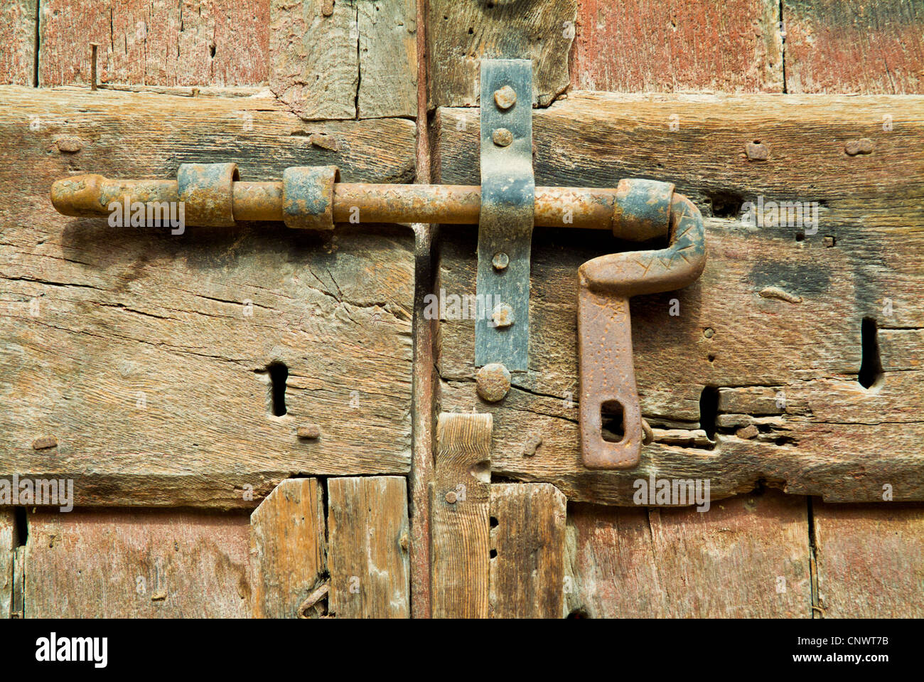 Rusty lock and bolt on a door Stock Photo - Alamy
