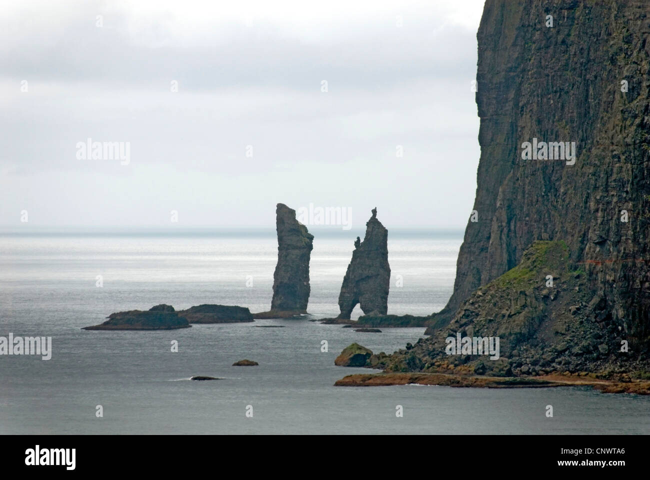 rocks Risin og Kellingin, rock wall of Kap Kollur, Denmark, Faroe ...