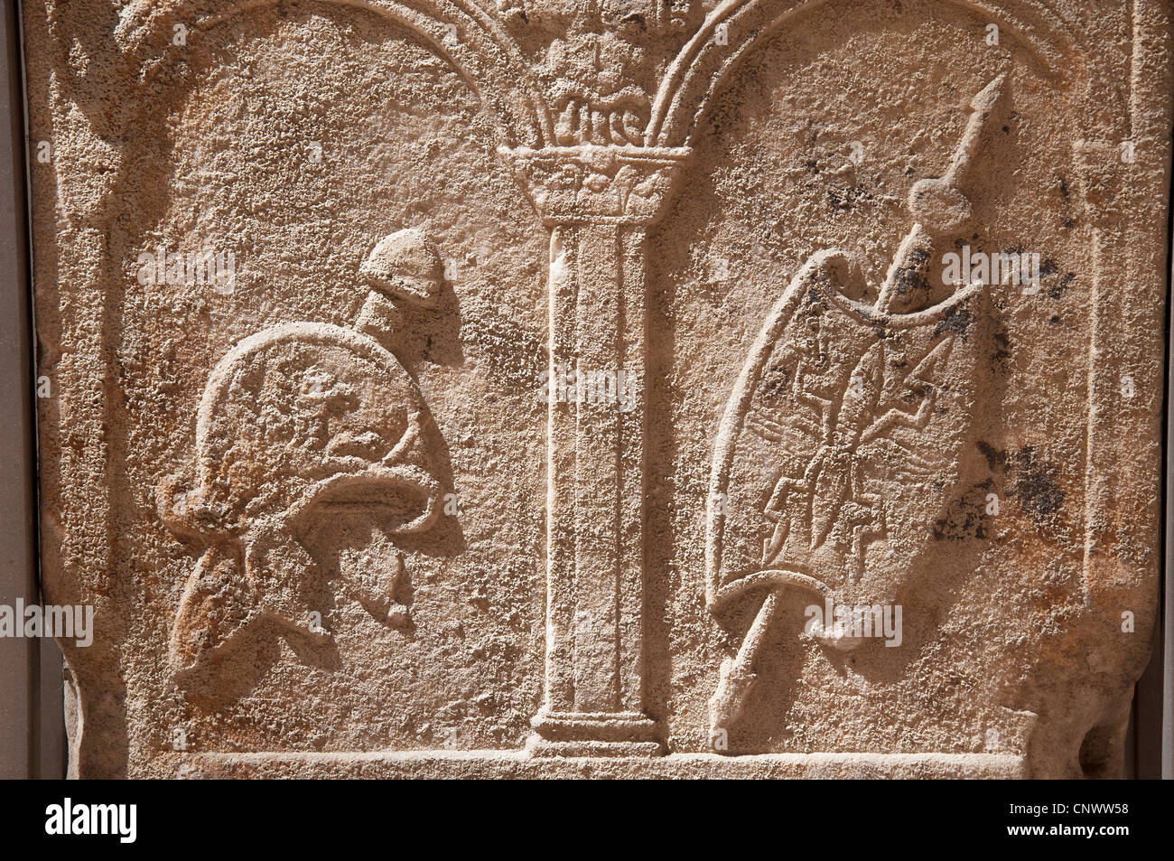 Stone Carving of Medieval weapons in Modena a city in the Emilia ...