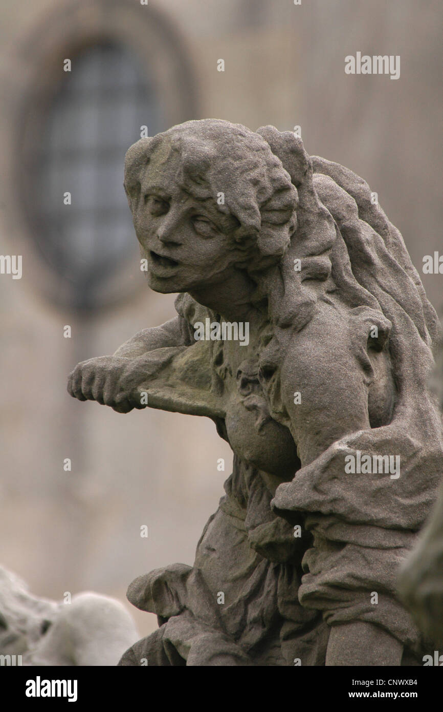 Allegory of Despair. Baroque statue by Matthias Bernhard Braun in front ...