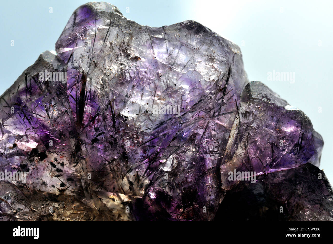 Amethyst/smoky quartz with inclusions of rutile and haematite Stock ...