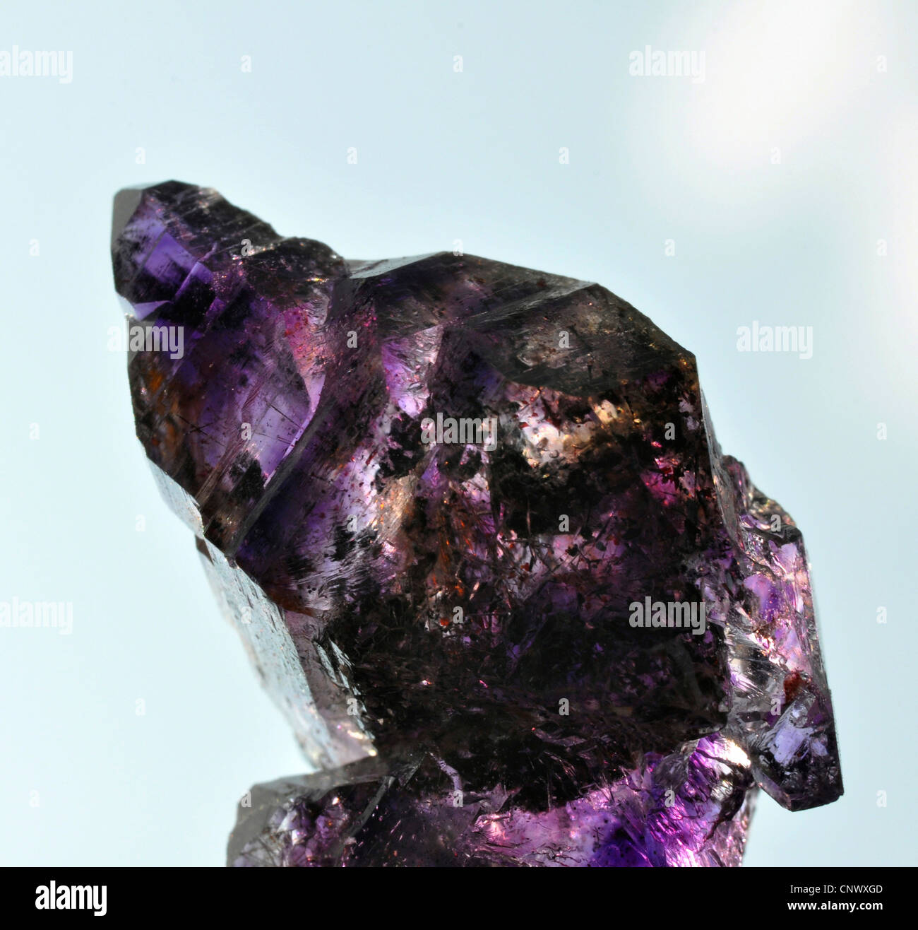 amethyst with rutile needles and inclusions of haematite Stock Photo ...