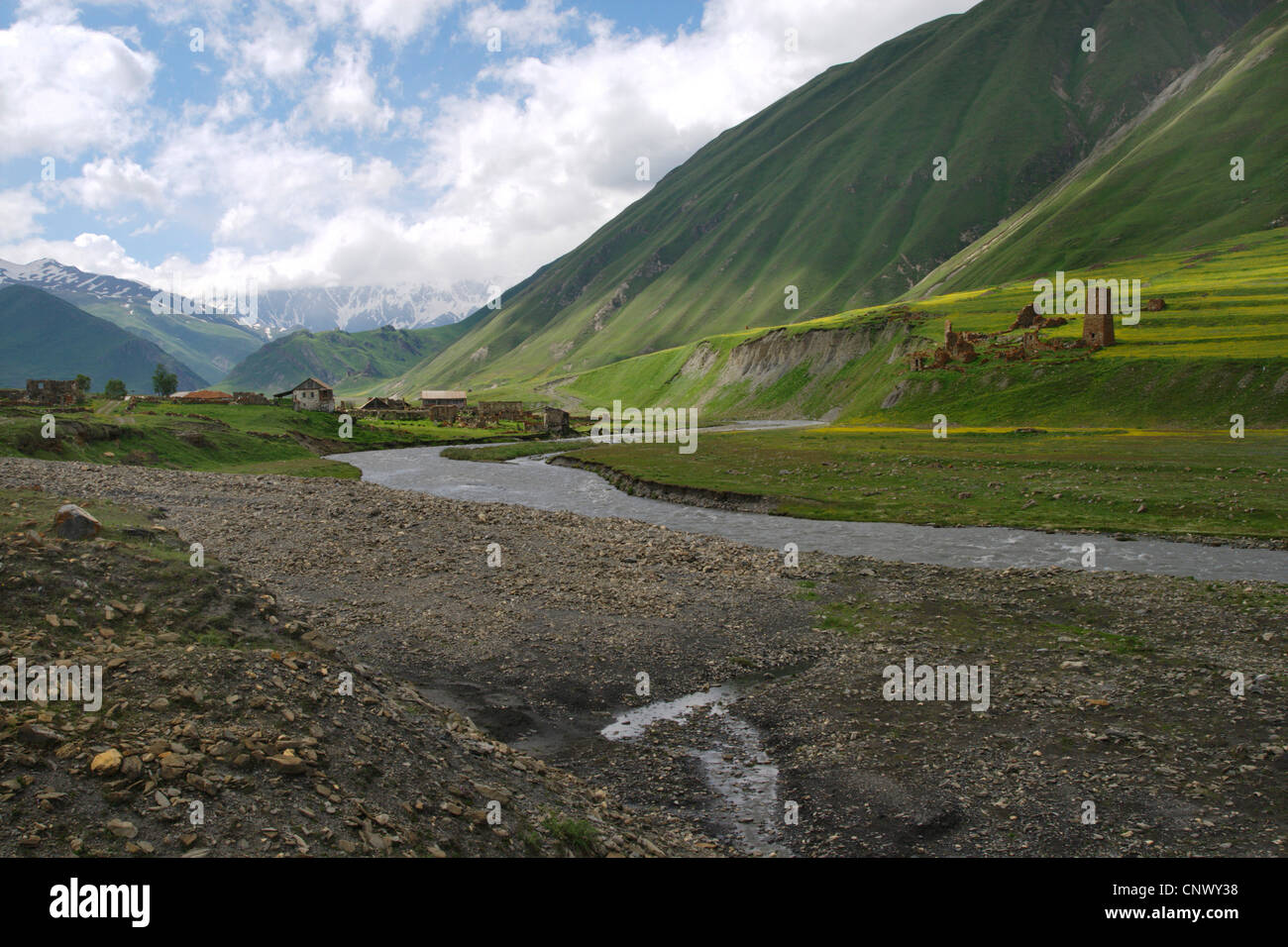 wide valley with a river, an abandonned village and a mediaeval ...