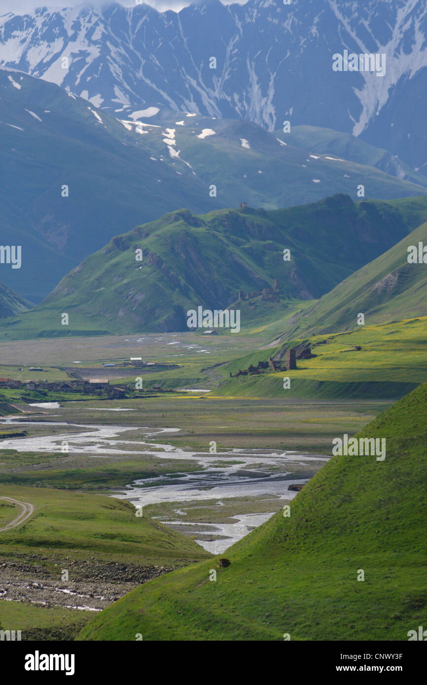 view over wide valley with river, abandonned village and mediaeval ...