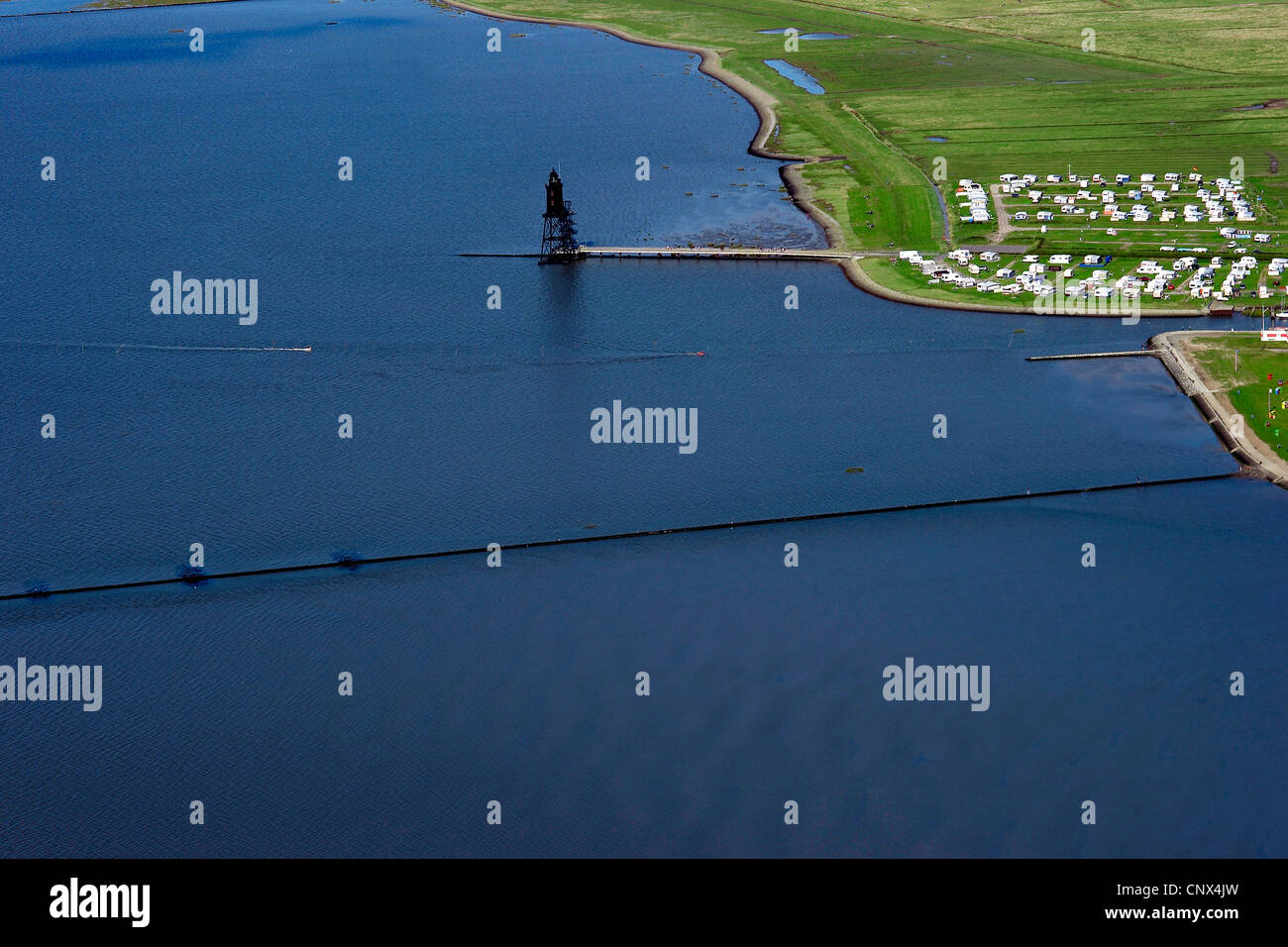 port entrance of Dorum-Neufeld with lighthouse Obereversand, Germany ...
