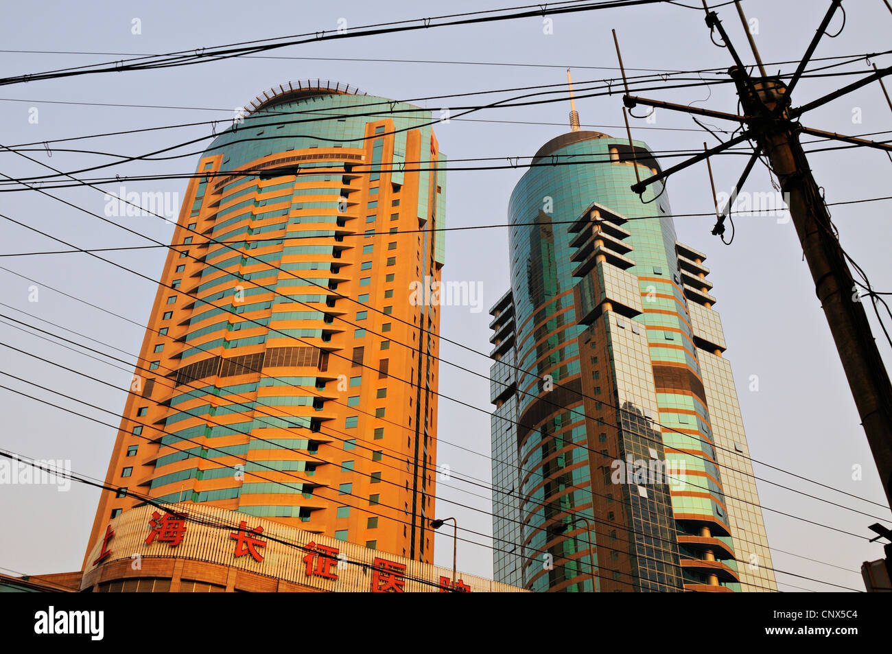 Modern skyscrapers and busy electrical power-lines, Shanghai, China ...
